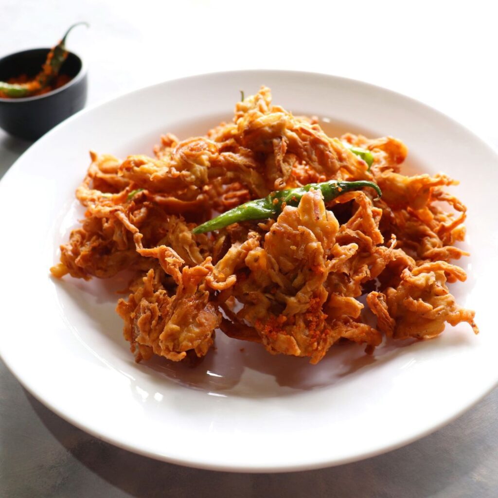 Onion Pakoda Recipe - Crispy, Delicious, and Easy to Make - Pure N Desi